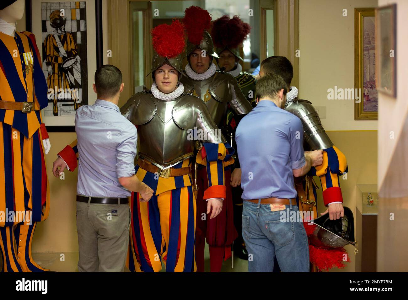 New Vatican Swiss Guards wear their uniforms and armors prior to a ...