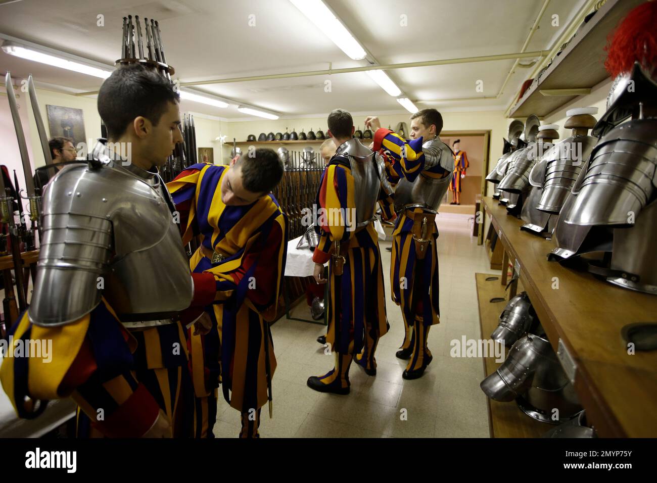 New Vatican Swiss Guards wear their uniforms and armors prior to a ...