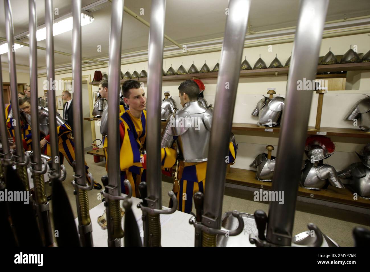 New Vatican Swiss Guards wear their uniforms and armors prior to a ...