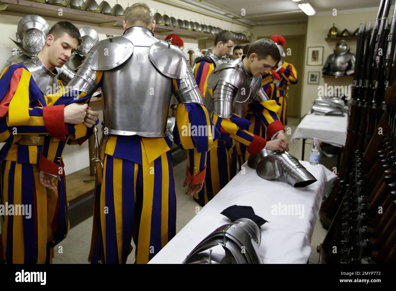 New Vatican Swiss Guards wear their uniforms and armors prior to a ...