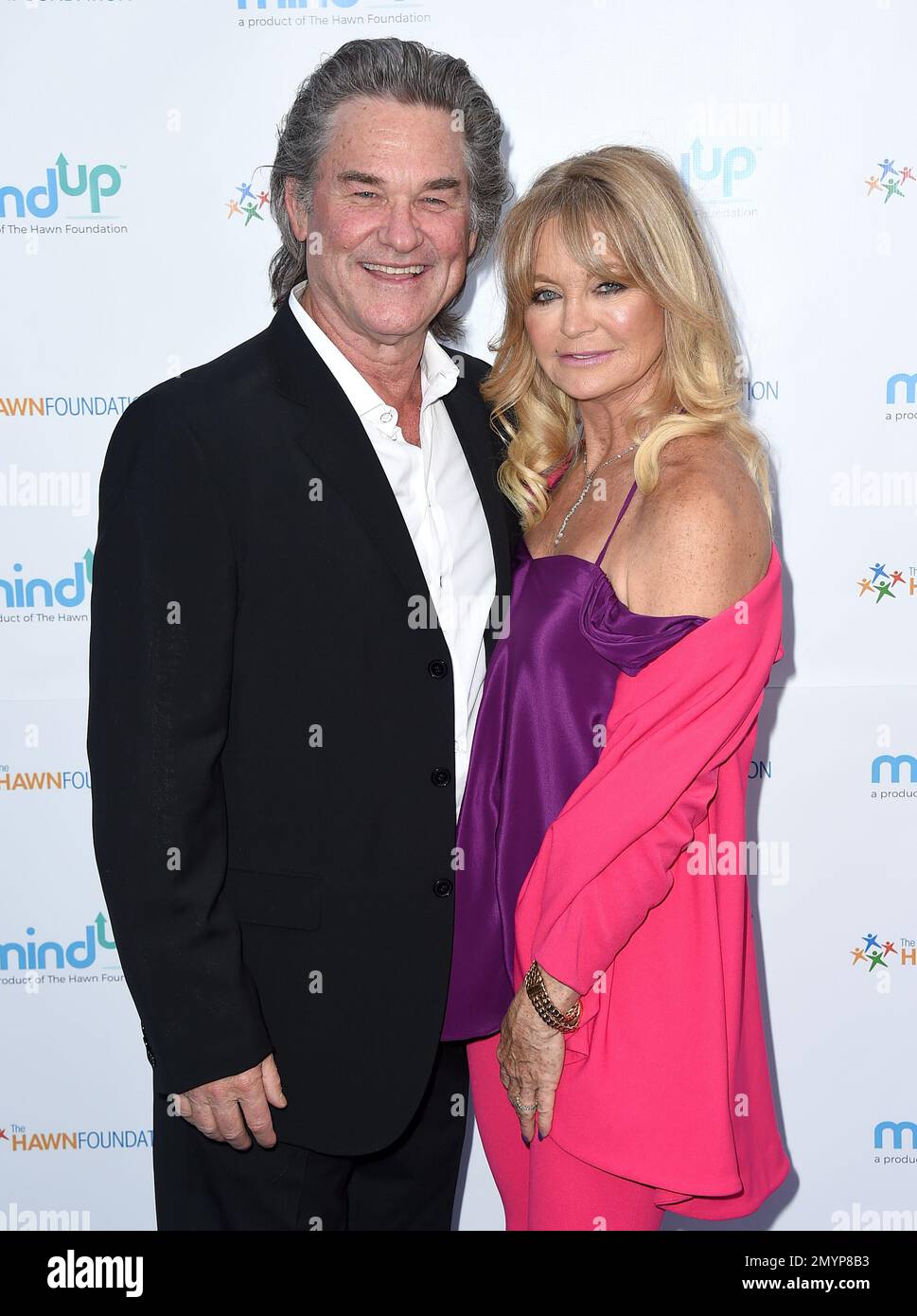 Kurt Russell, left, and Goldie Hawn arrive at Goldie's Love In For Kids ...