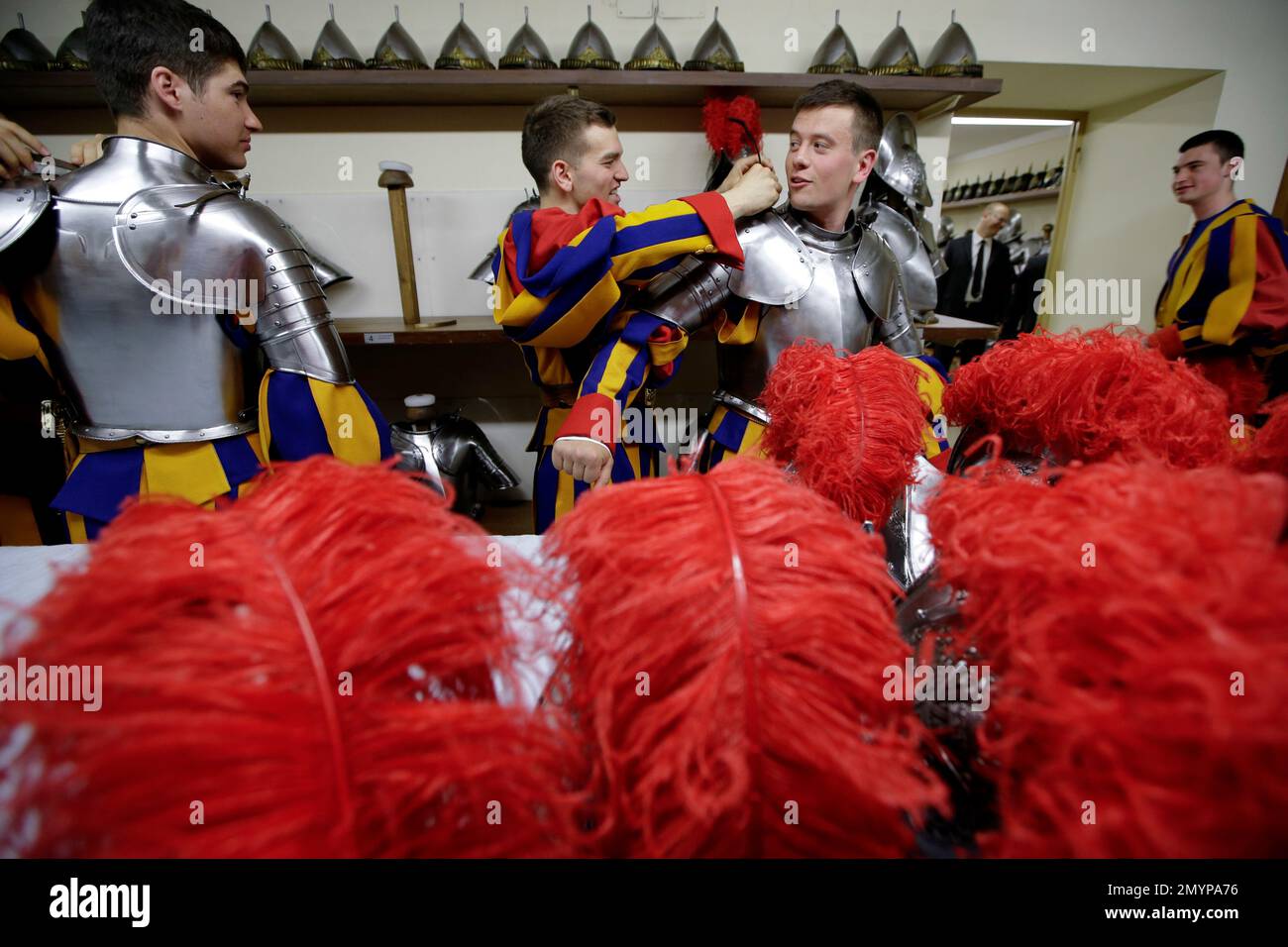 New Vatican Swiss Guards wear their uniforms and armors prior to a ...