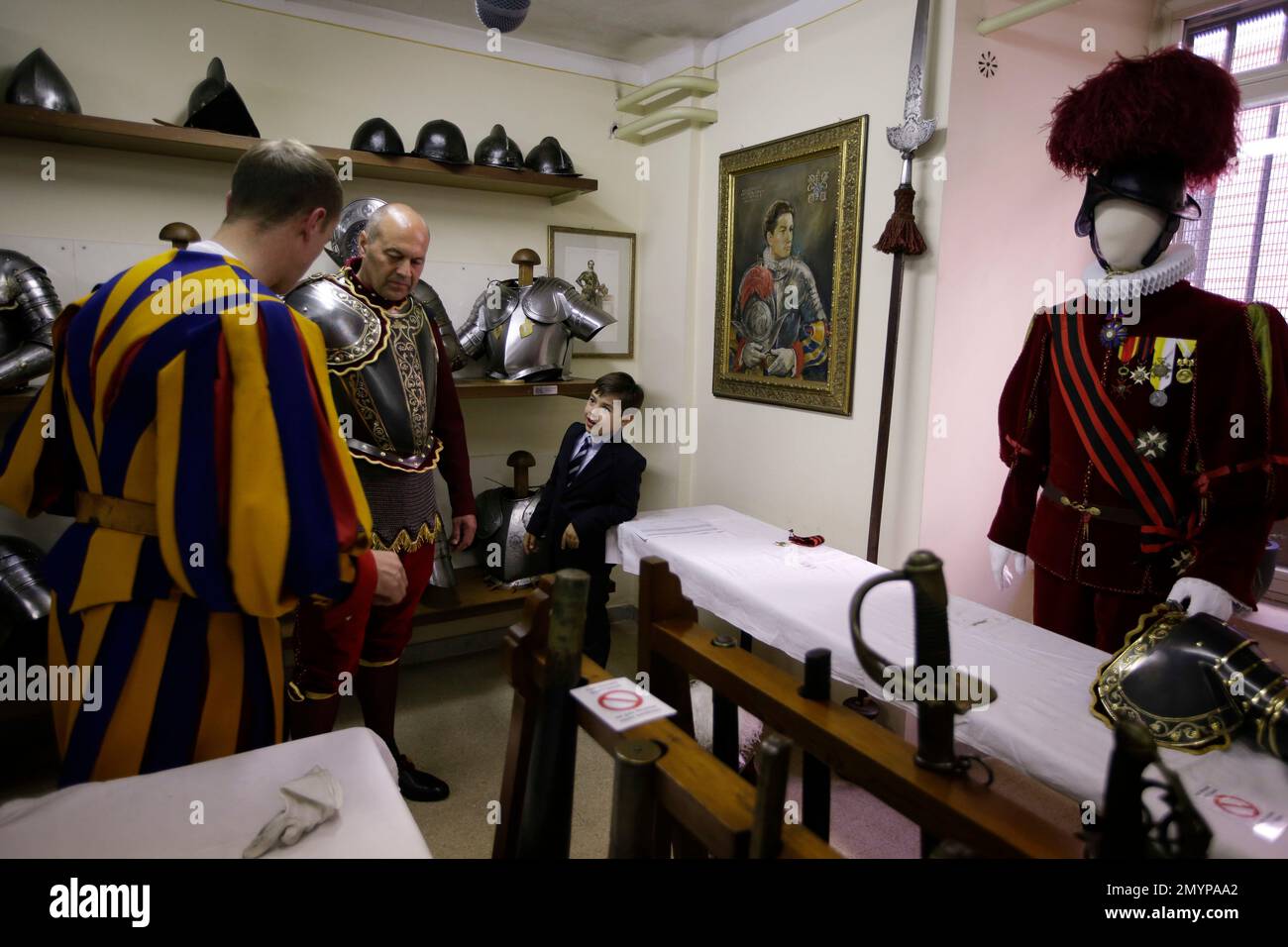 New Vatican Swiss Guards wear their uniforms and armors prior to a ...