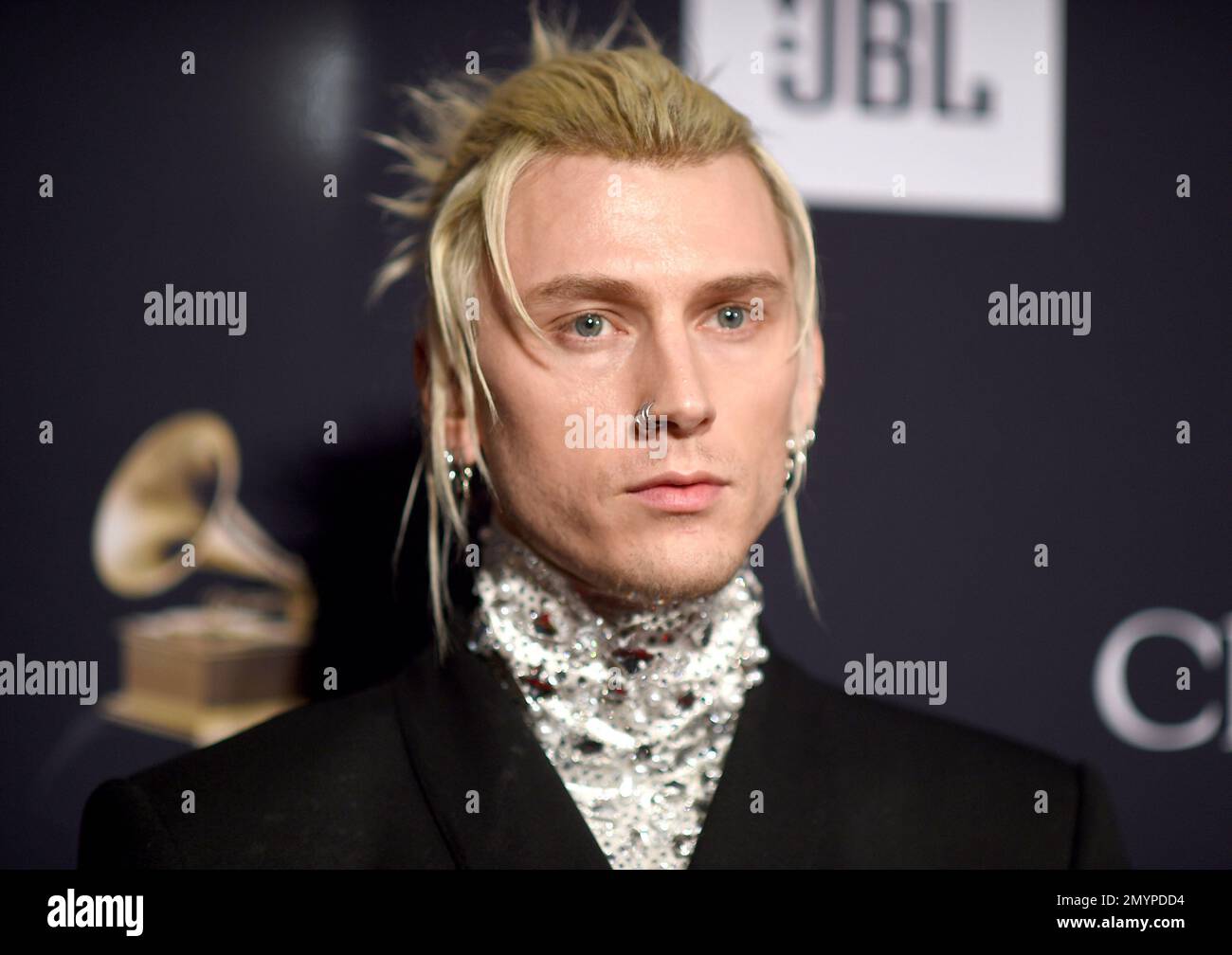 Machine Gun Kelly arrives at the Pre-Grammy Gala on Saturday, Feb. 4 ...