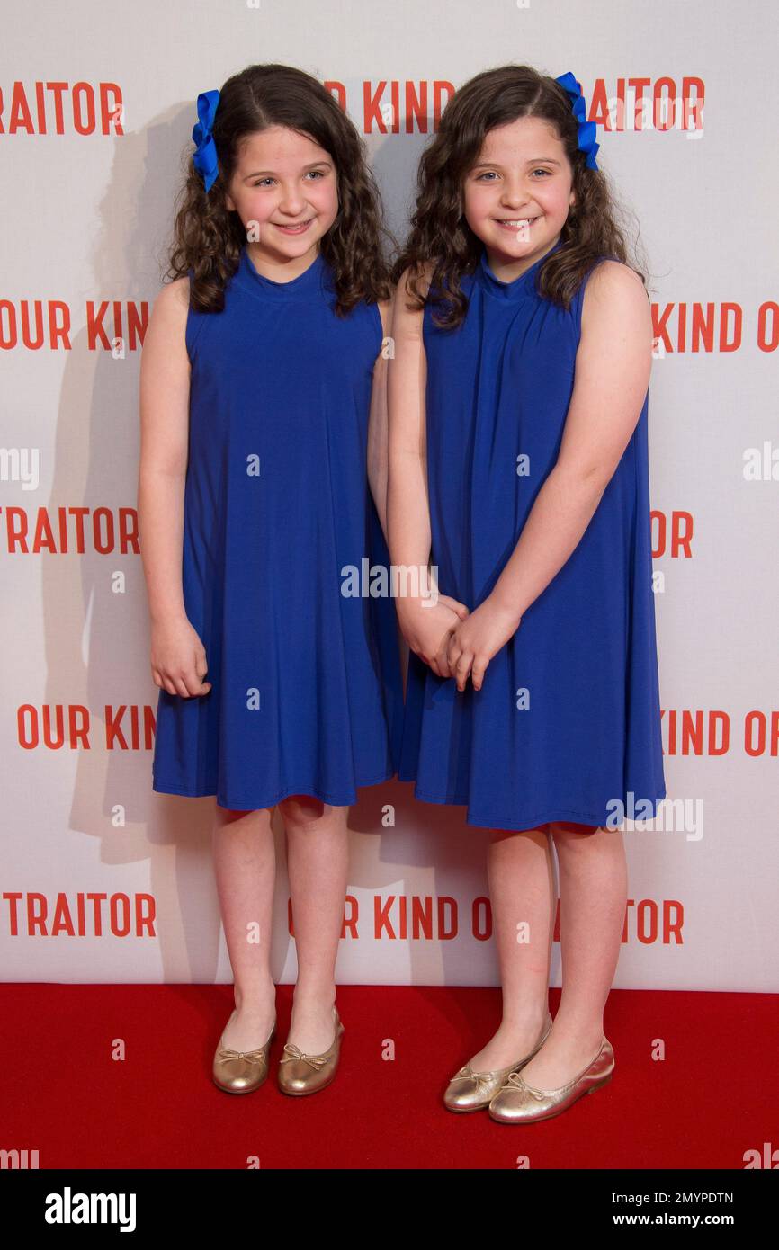 Twins Emily Beacock and Rosanna Beacock pose for photographers upon ...