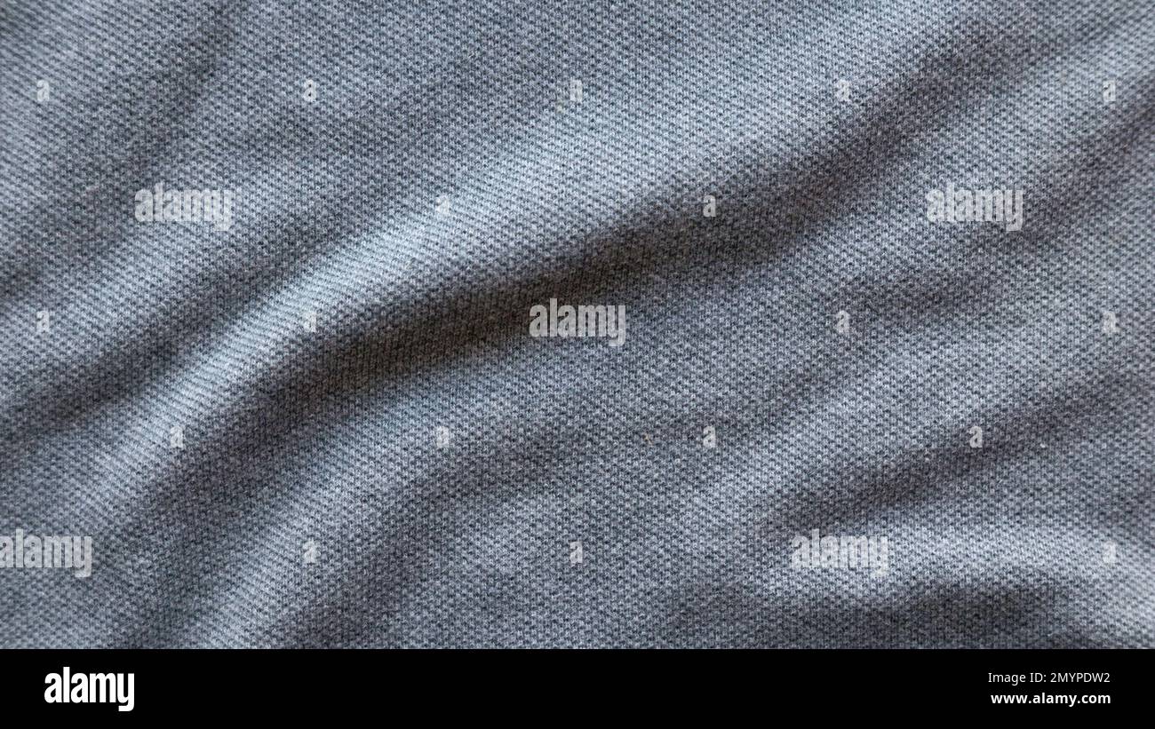 Grey fabric cloth with folds background and texture Stock Photo - Alamy