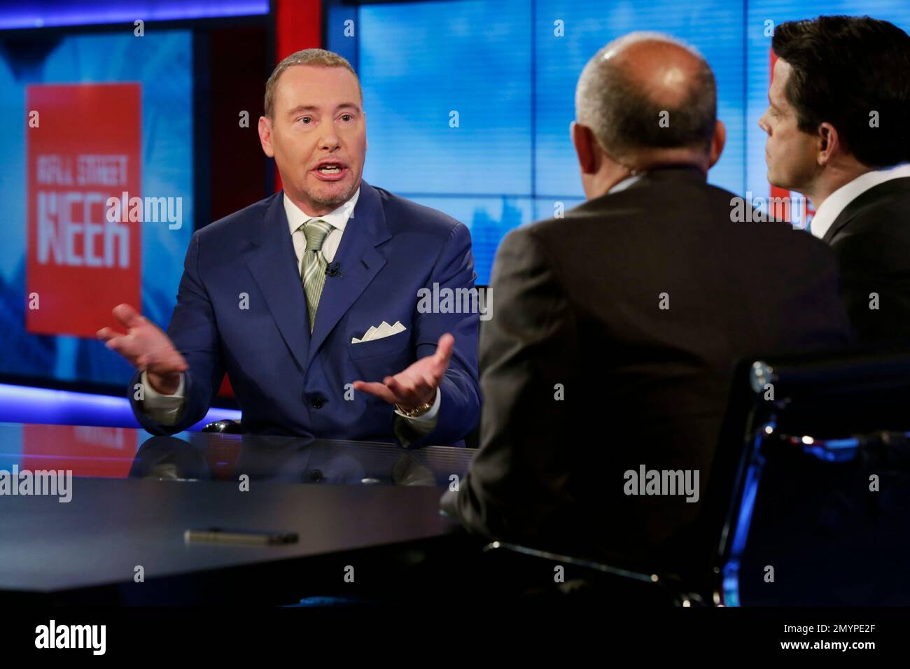 DoubleLine CEO Jeffrey Gundlach, left, is interviewed by co-hosts Gary ...