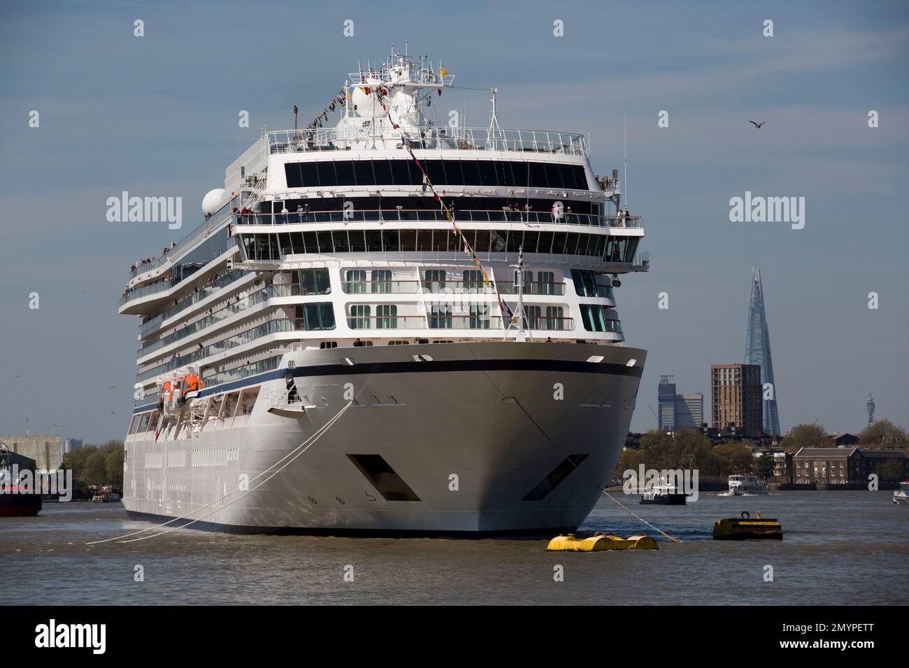 The Viking Sea cruise ship docks at Greenwich as the Shard, the tallest building in the UK ...