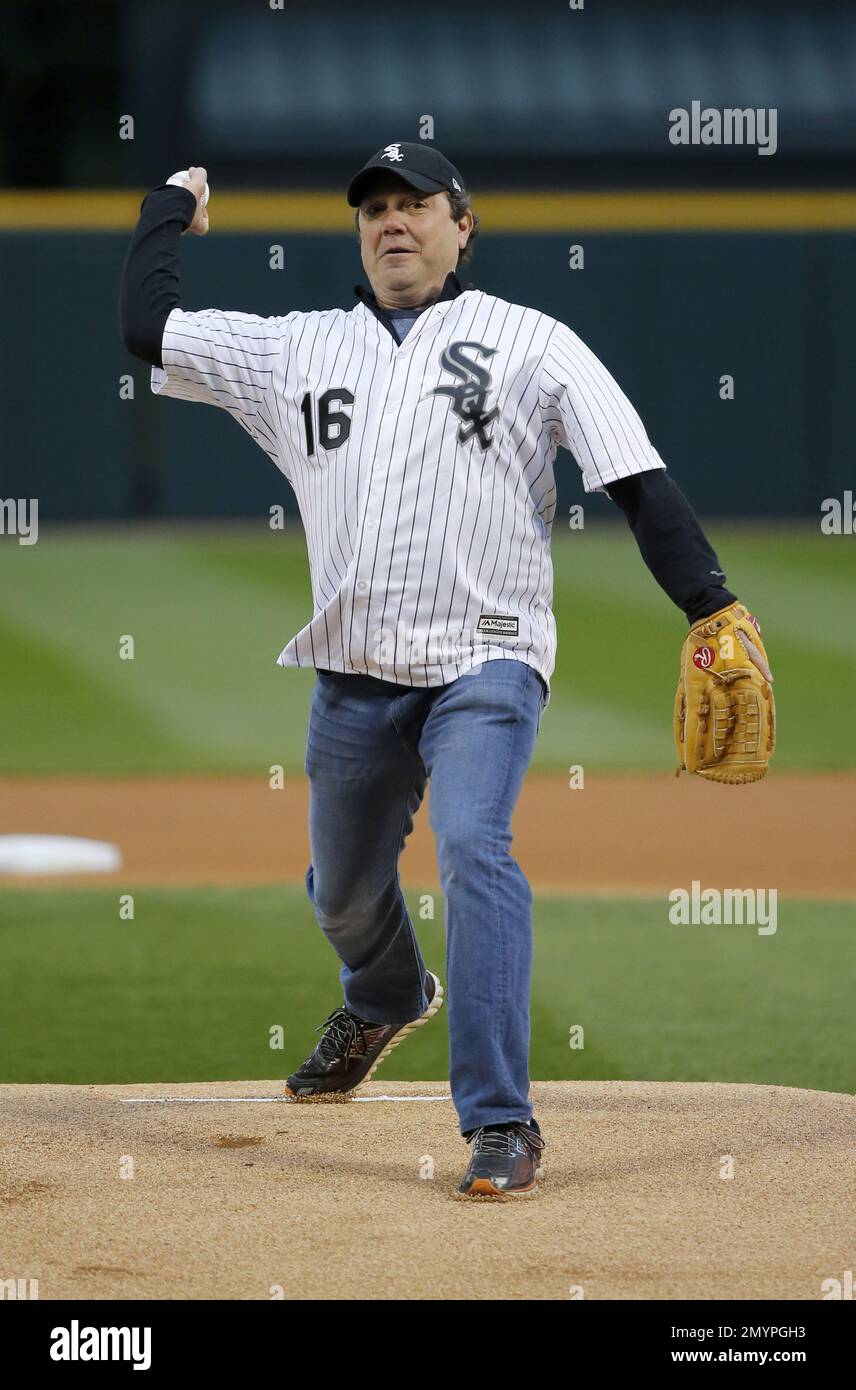 John "JoJo" Hermann throws out a ceremonial first pitch before a ...