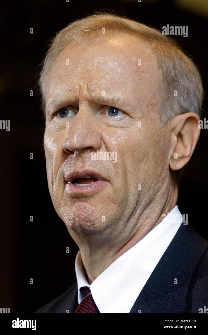 Illinois Gov. Bruce Rauner speaks to reporters in his office at the ...