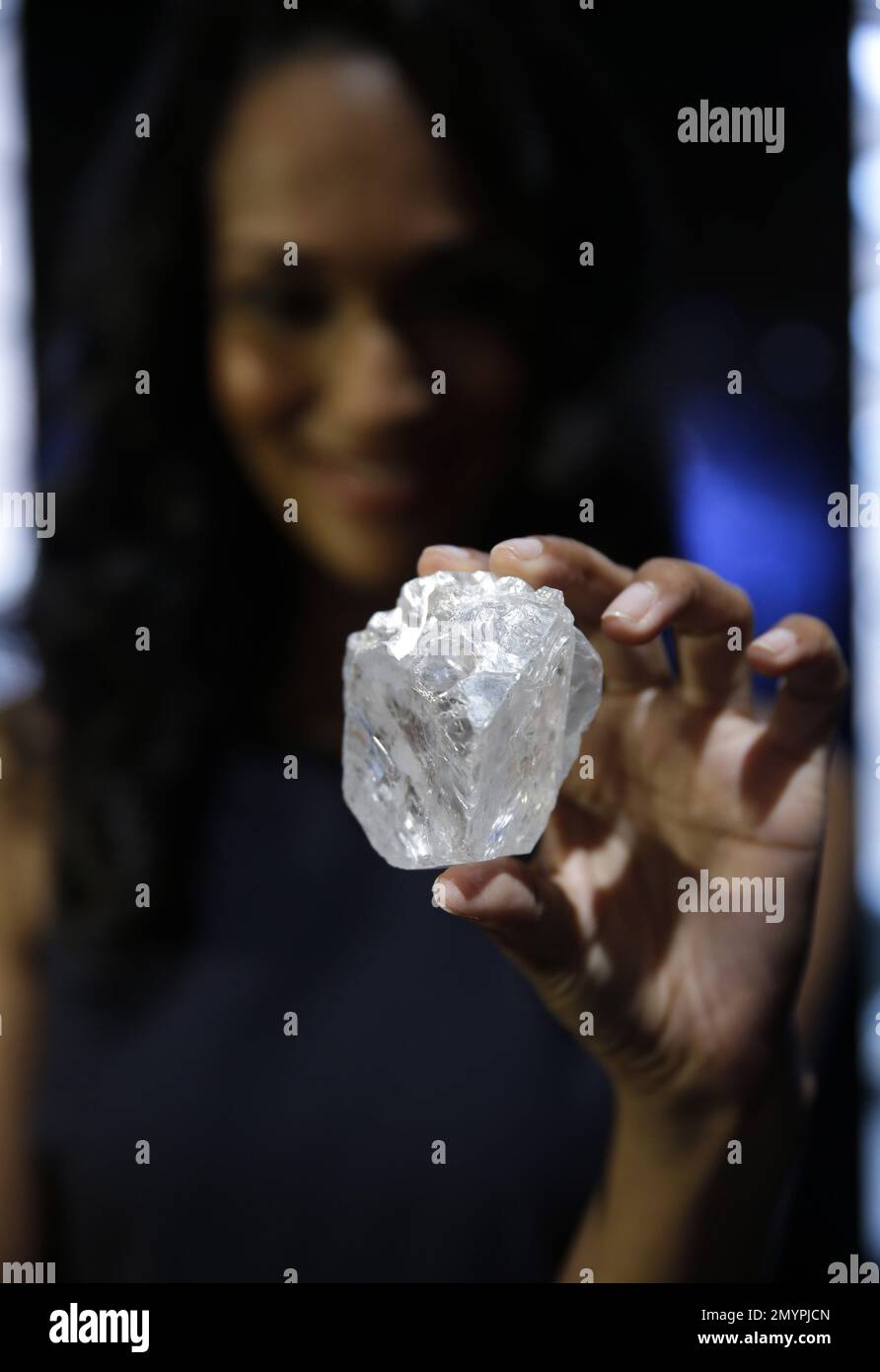 A model displays a large diamond at Sotheby's in New York, Wednesday ...