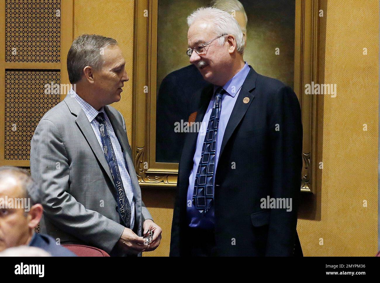 Senate President Andy Biggs, left, R-Gilbert, talks with Sen. John ...