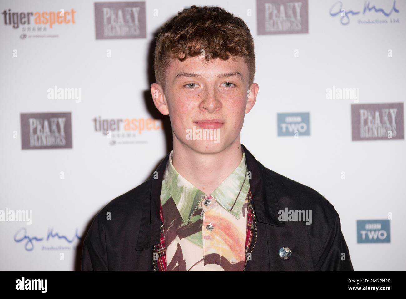 Actor Harry Kirton poses for photographers upon arrival at the ...