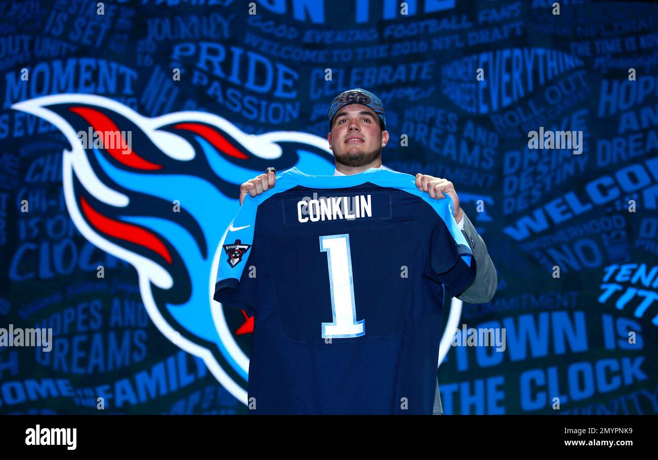 Michigan State’s Jack Conklin poses for photos after being selected by ...