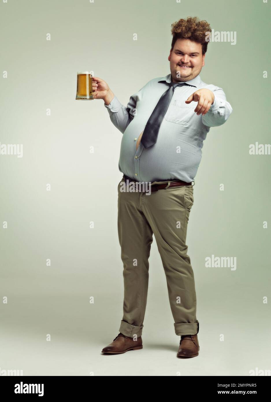 Ive been waiting for you. an overweight man pointing at the camera ...