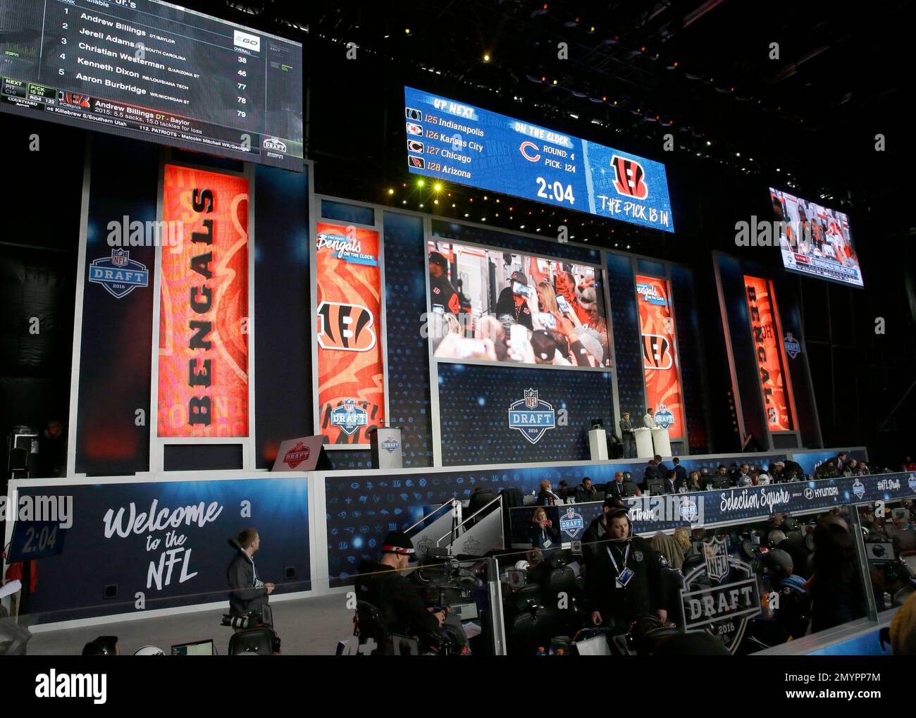 Representatives from NFL football teams begin their work during the ...