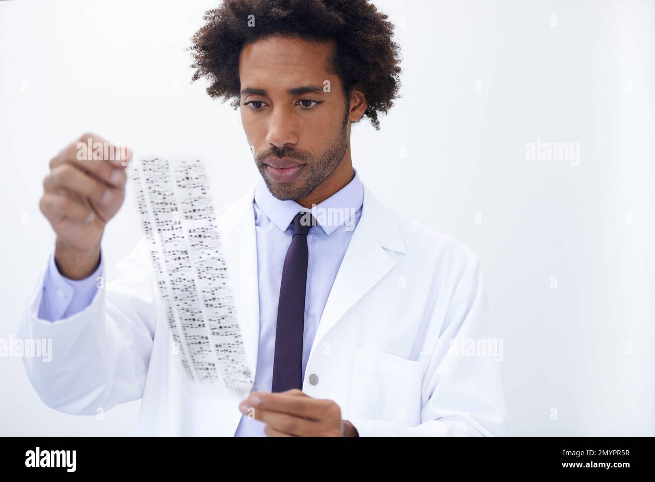 Everyones DNA signature is different. a handsome male scientist ...