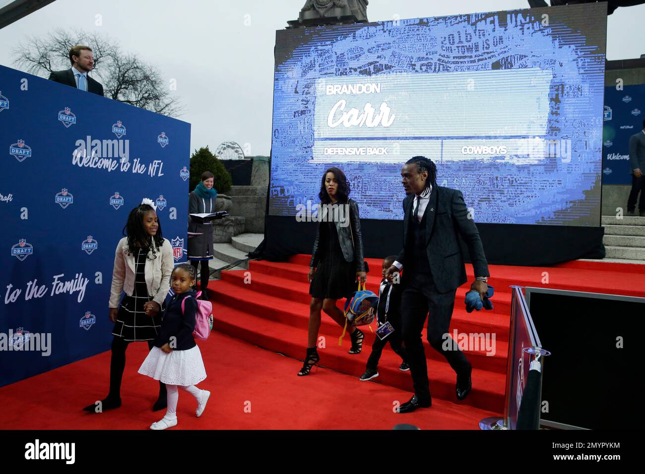 Former Walter Payton Men of the Year Brandon Carr poses for photos upon ...