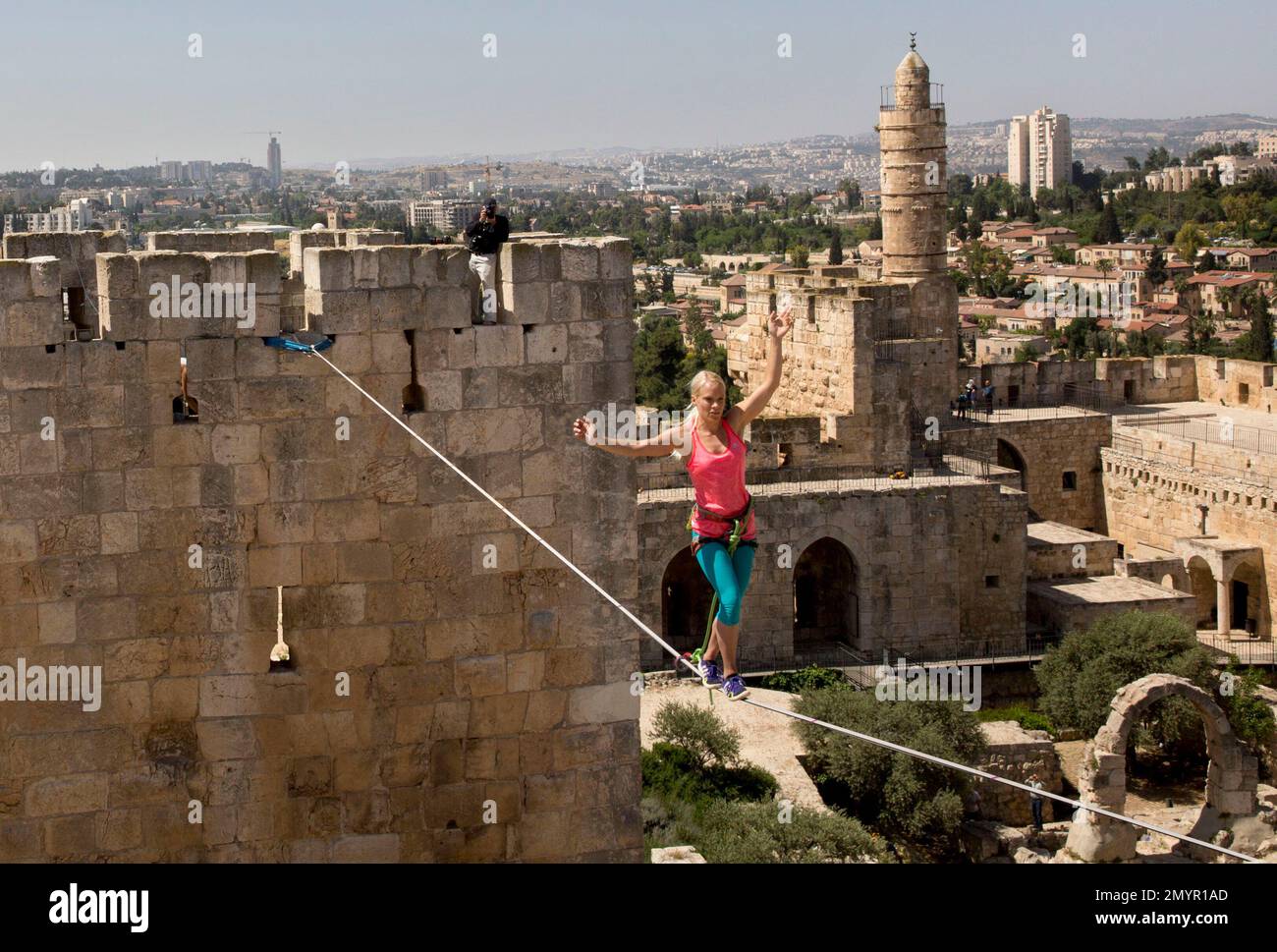 American Heather Larsen walks on a slackline over the Tower of David in ...