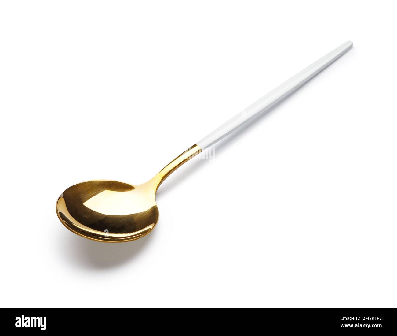 Golden spoon isolated on white background Stock Photo - Alamy