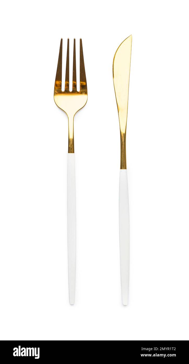 Golden cutlery on top Cut Out Stock Images & Pictures - Alamy