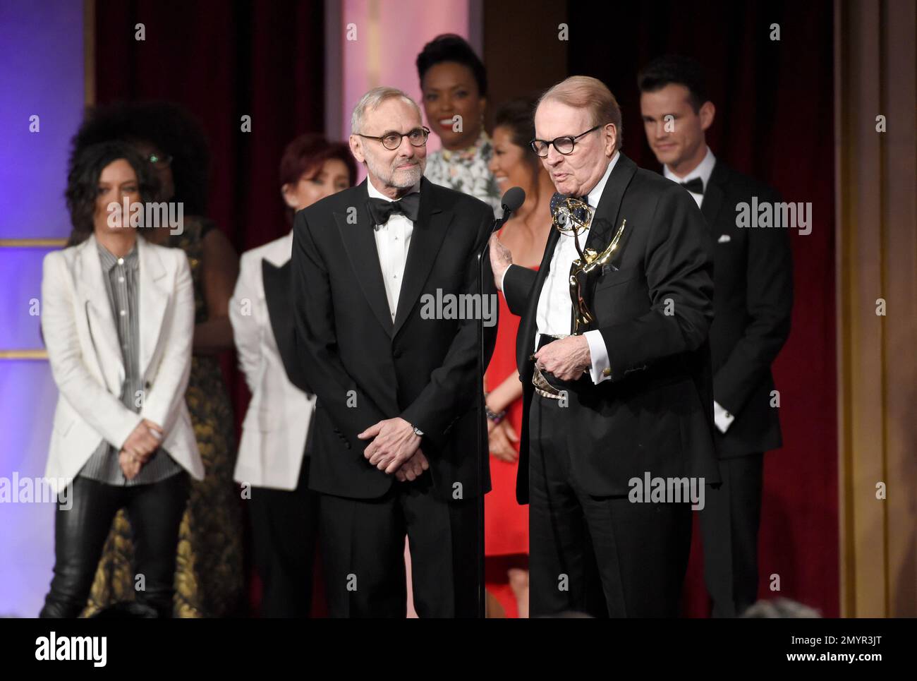 Rand Morrison, left, and Charles Osgood accept the award for ...