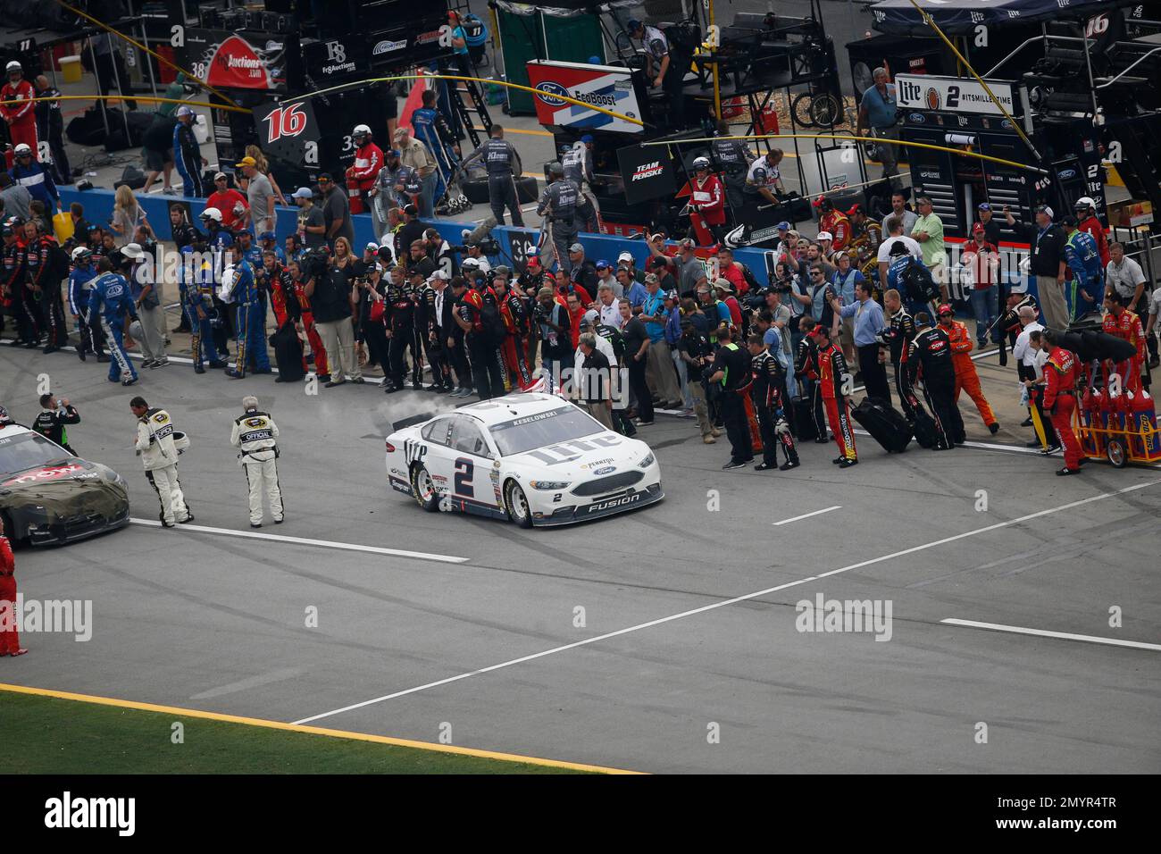 NASCAR driver Brad Keselowski pulls into pit row after winning during ...
