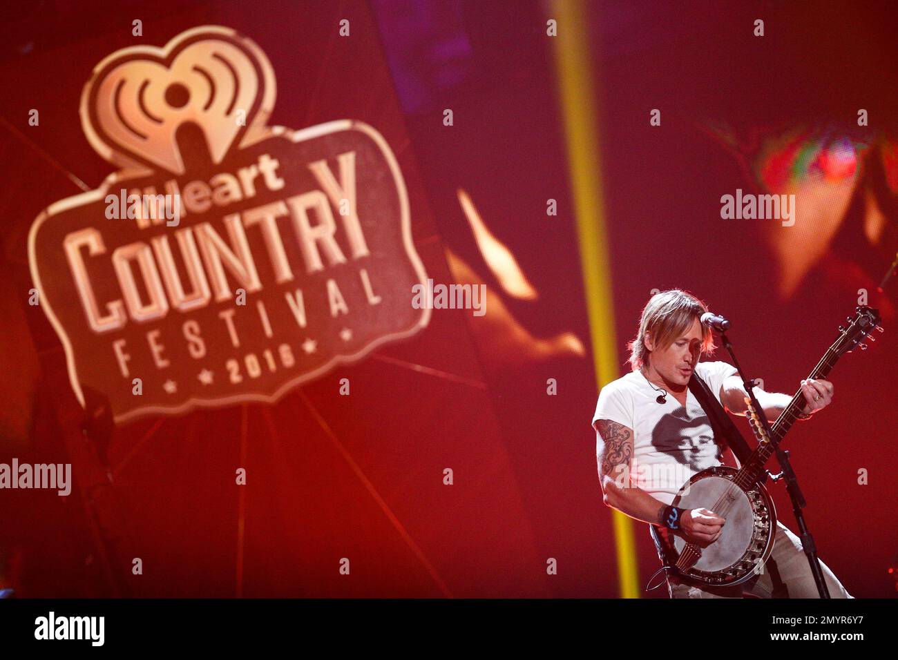 Keith Urban performs during the 2016 iHeartRadio Country Festival held ...