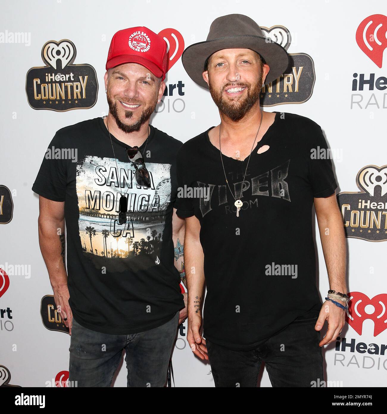 Chris Lucas, left, and Preston Brust from the band LOCASH attend the ...
