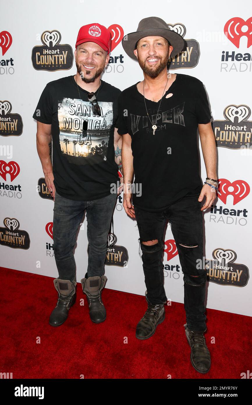 Chris Lucas, left, and Preston Brust from the band LOCASH attend the ...