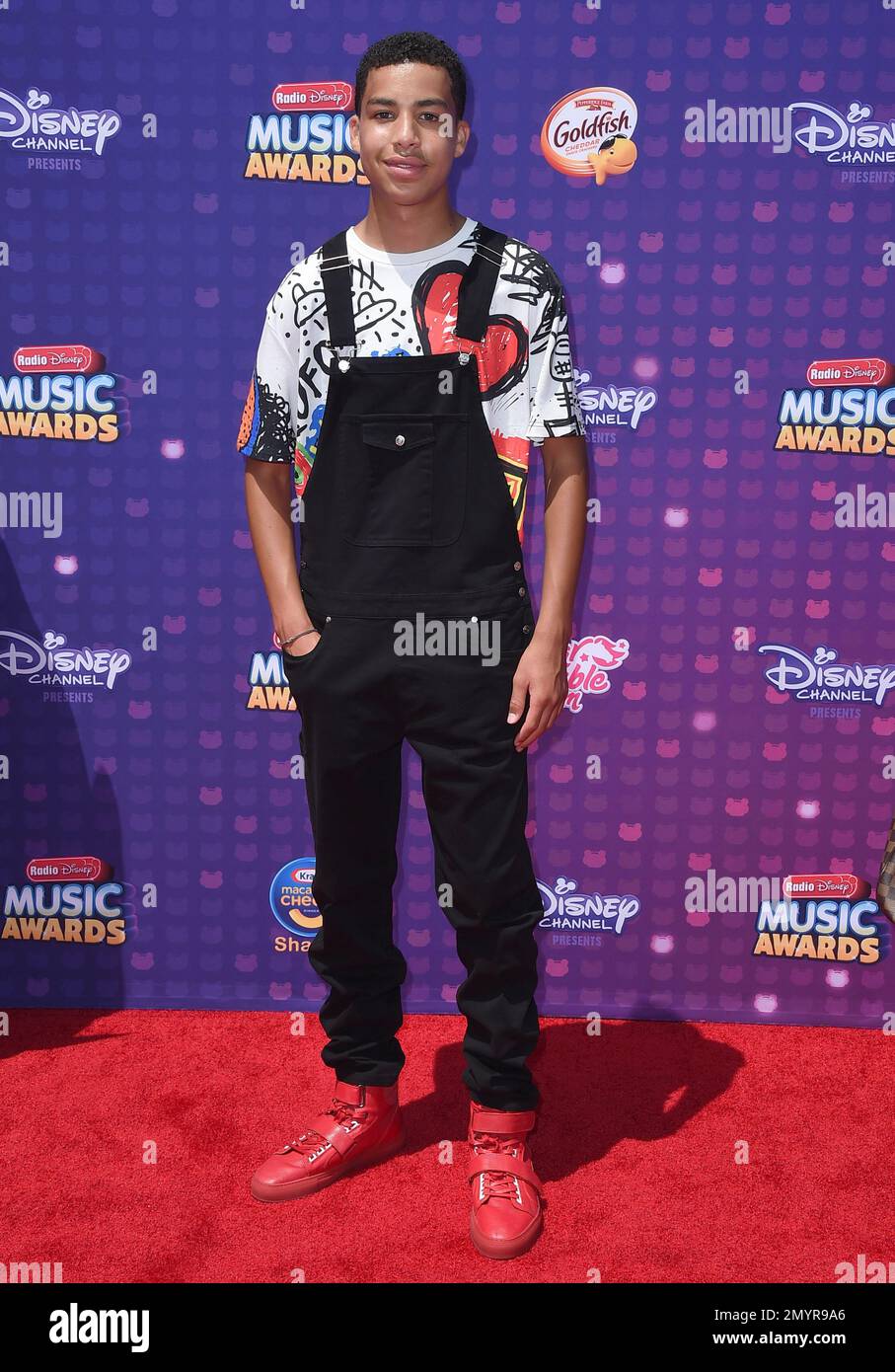 Marcus Scribner arrives at the Radio Disney Music Awards at the ...