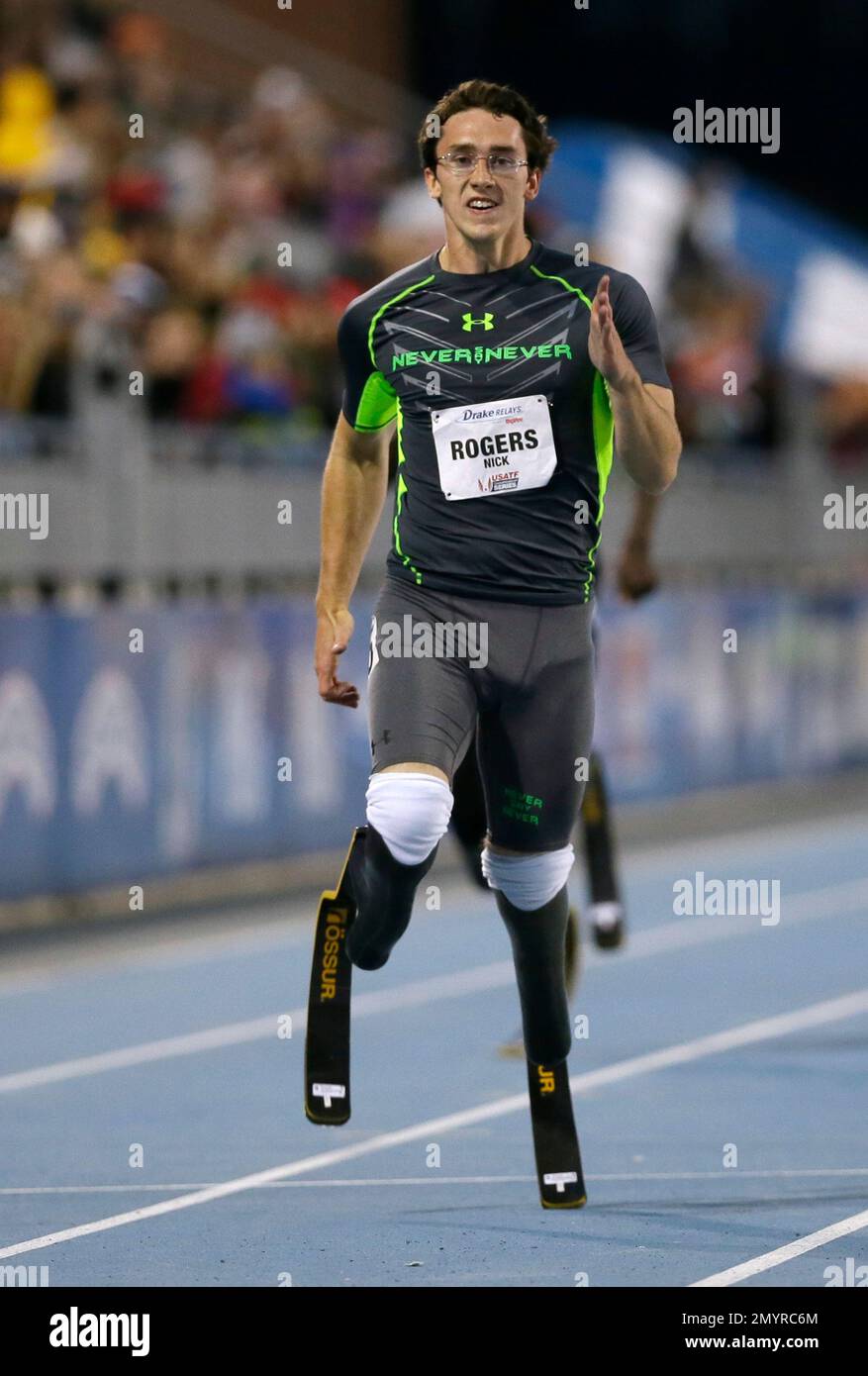 Nick Rogers eyes the finish line as he wins the men's 200-meter ...