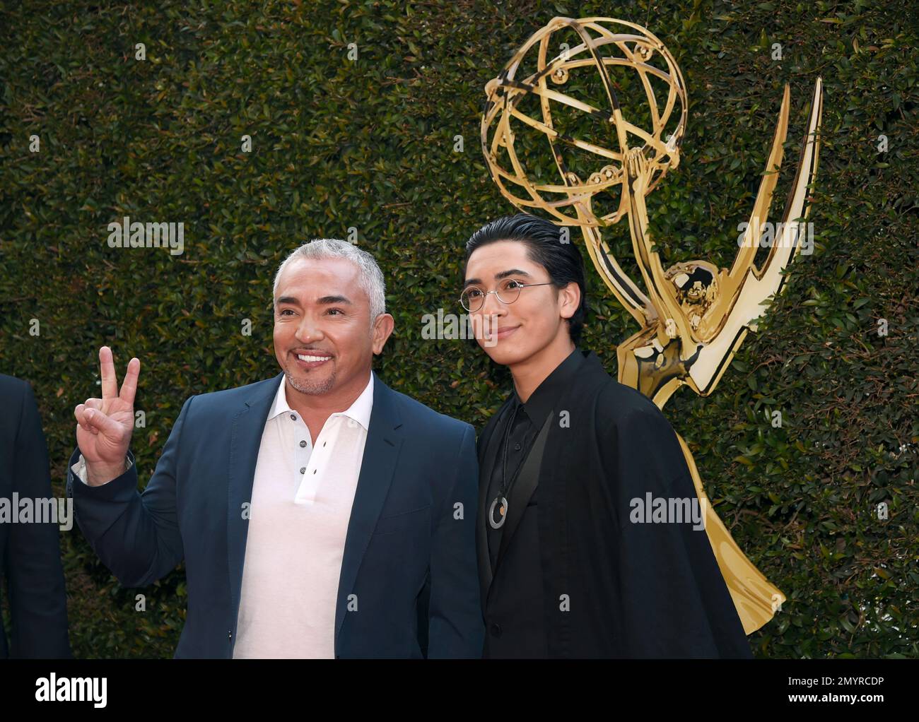 Cesar Millan, left, and Calvin Millan arrive at the Daytime Creative ...