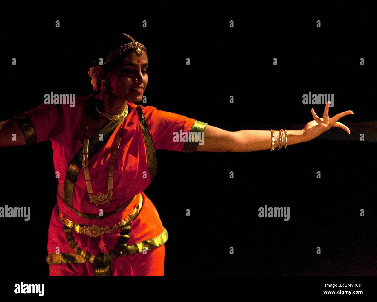 A Pakistani artist presents folk dance to celebrate the International ...