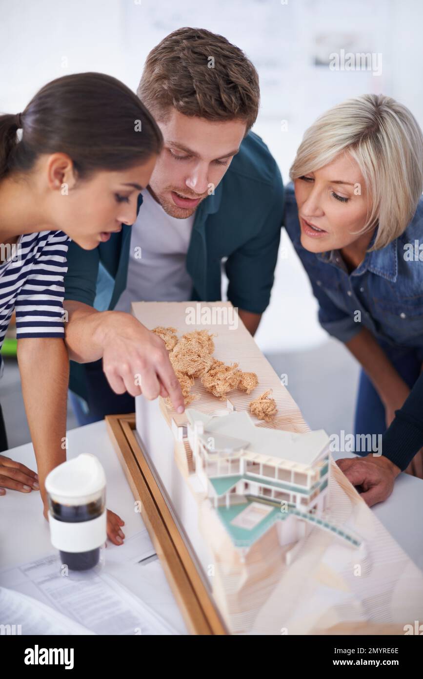 Adding some valuable input toward the design. a diverse group of people ...