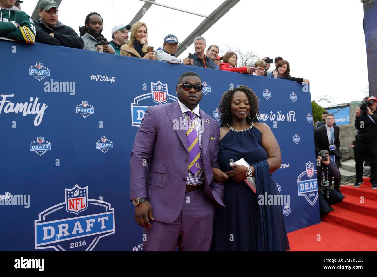 Alabama’s Jarran Reed, left, poses for photos upon arriving for the ...