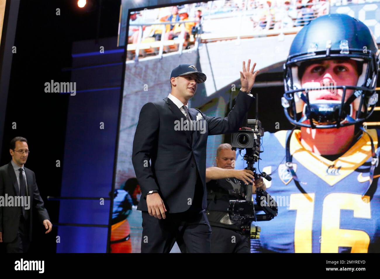 California’s Jared Goff walks on the stage after being selected by the ...
