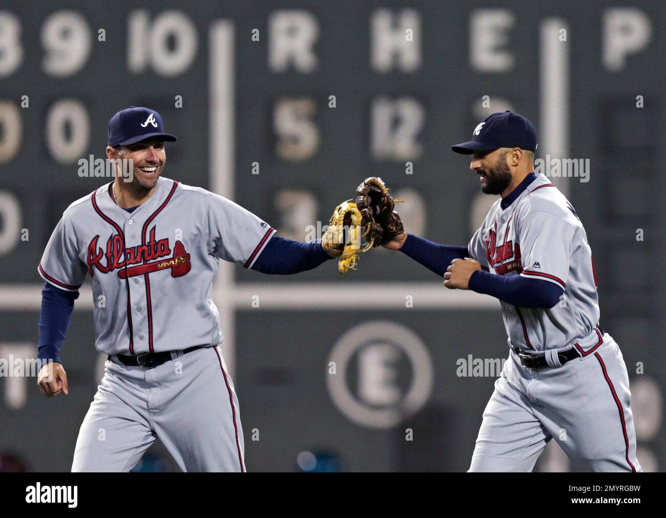 Atlanta Braves right fielder Nick Markakis, right, and left fielder ...