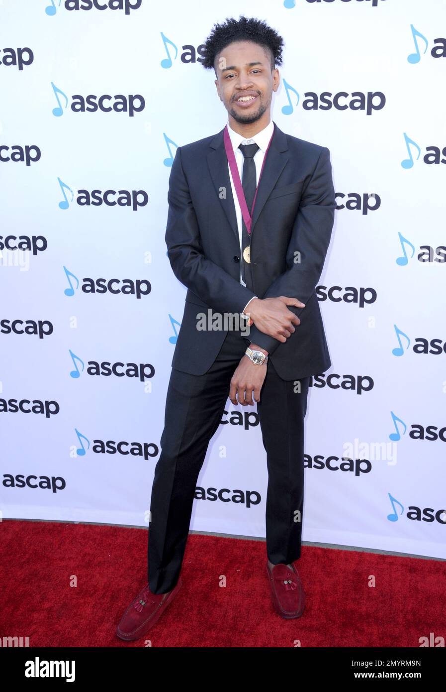 Emmanuel Nickerson, award winner for “The Hills” by The Weeknd, arrives ...