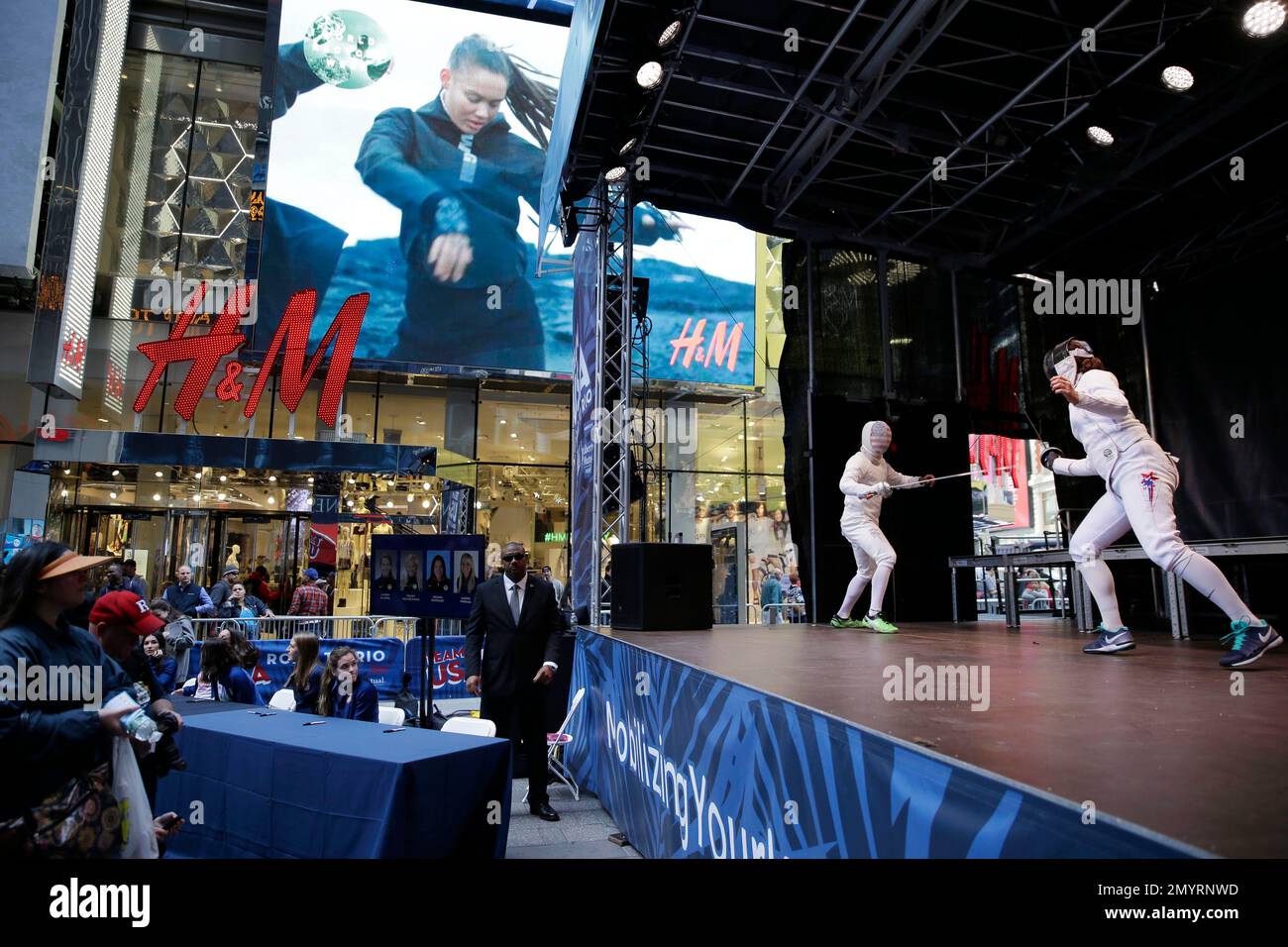 Olympic fencers Kat Holmes, right, and Jason Pryor give a fencing ...