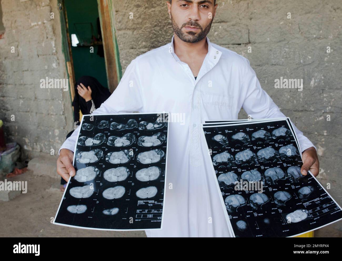 In this picture taken Friday, April 22, 2016, Egyptian father Islam ...