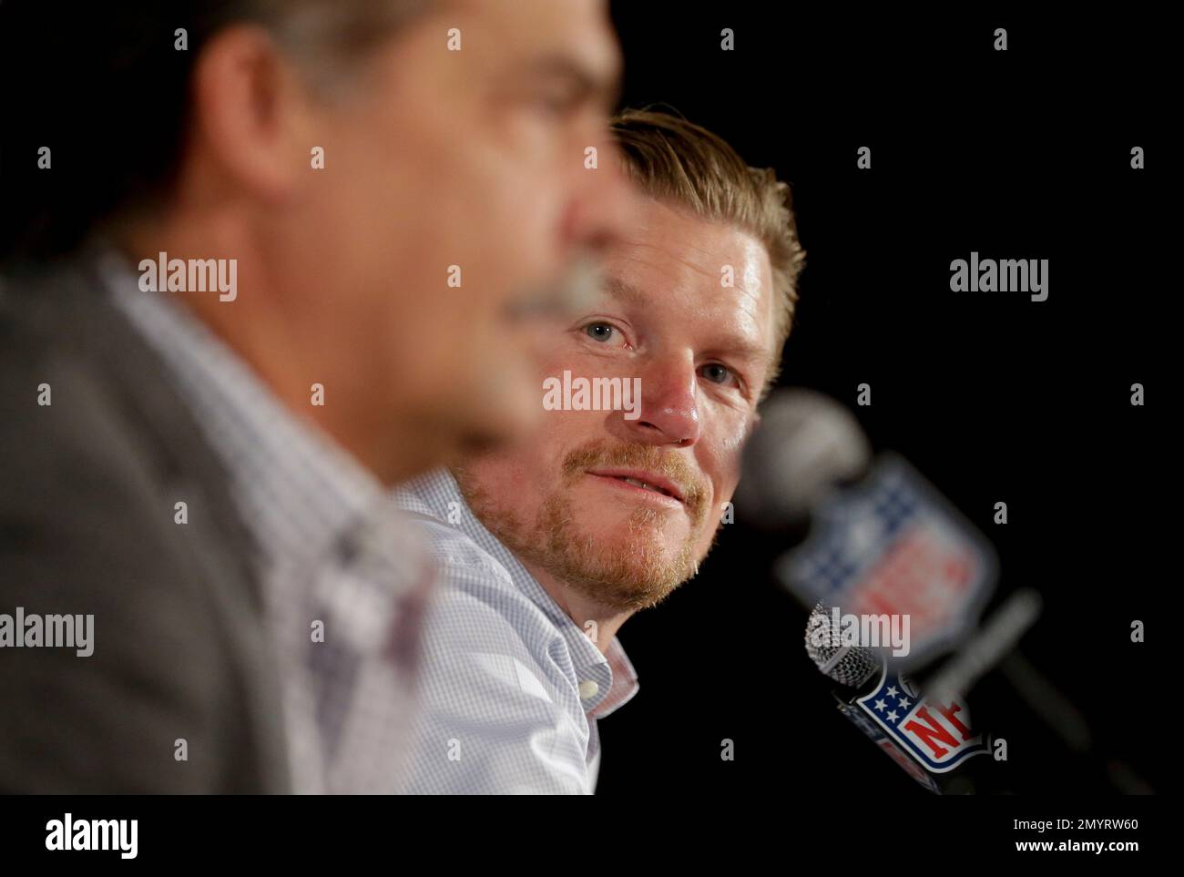 Los Angeles Rams general manager Les Snead, right, listens as head ...