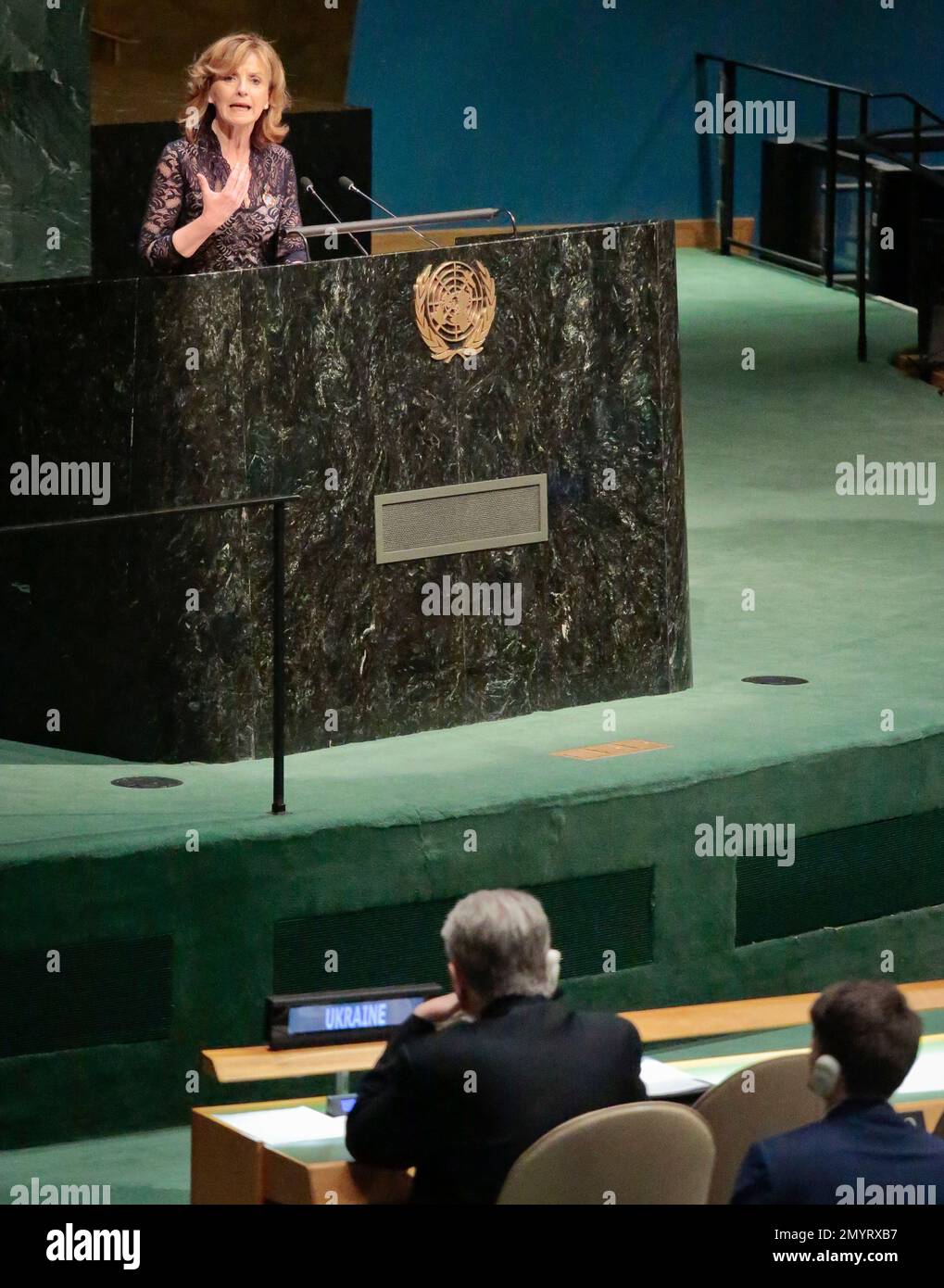 Members of the Ukraine delegation, bottom, listen as Chernobyl Children ...