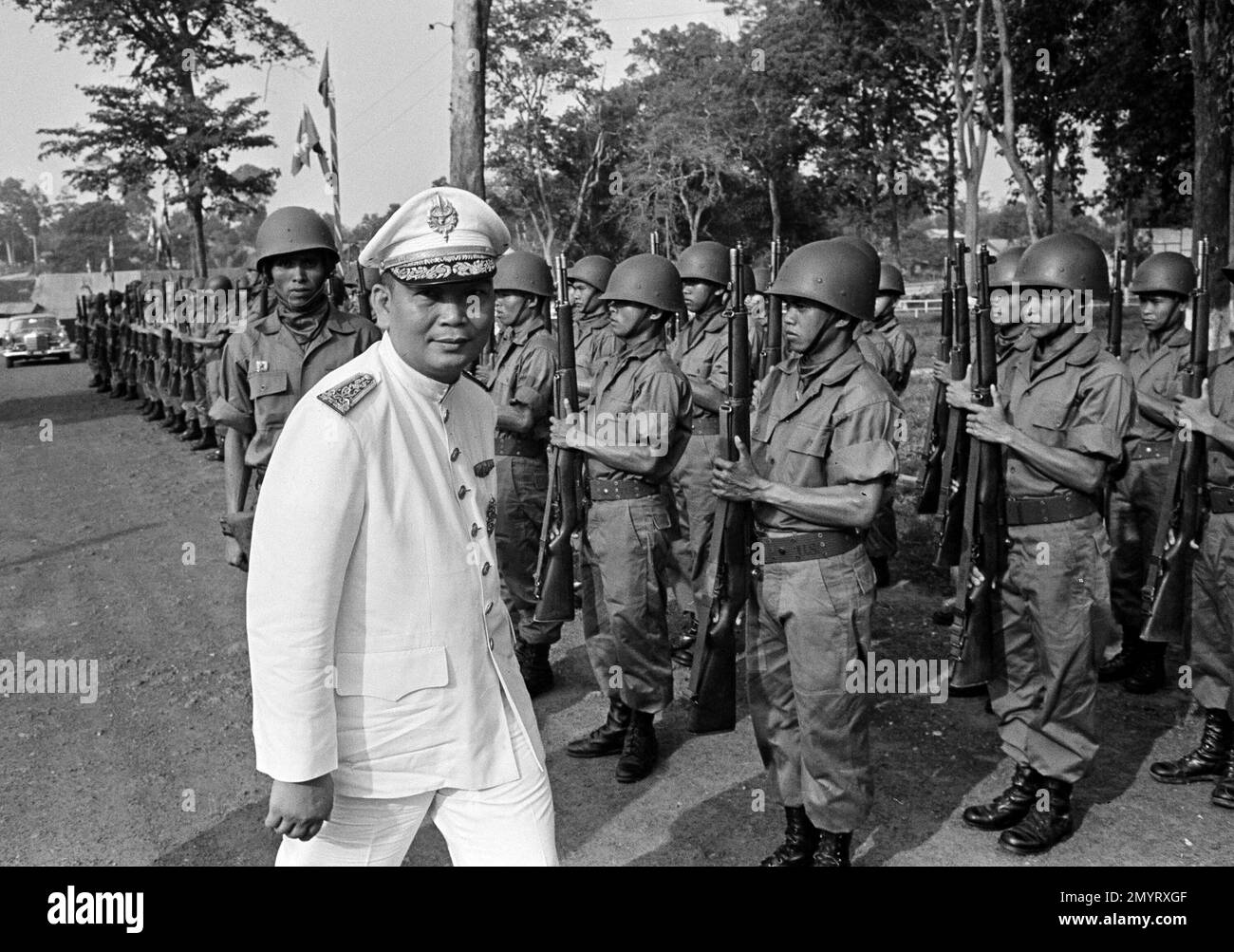 Rightist Vice Premier General Phoumi Nosavan of Laos, review his right ...