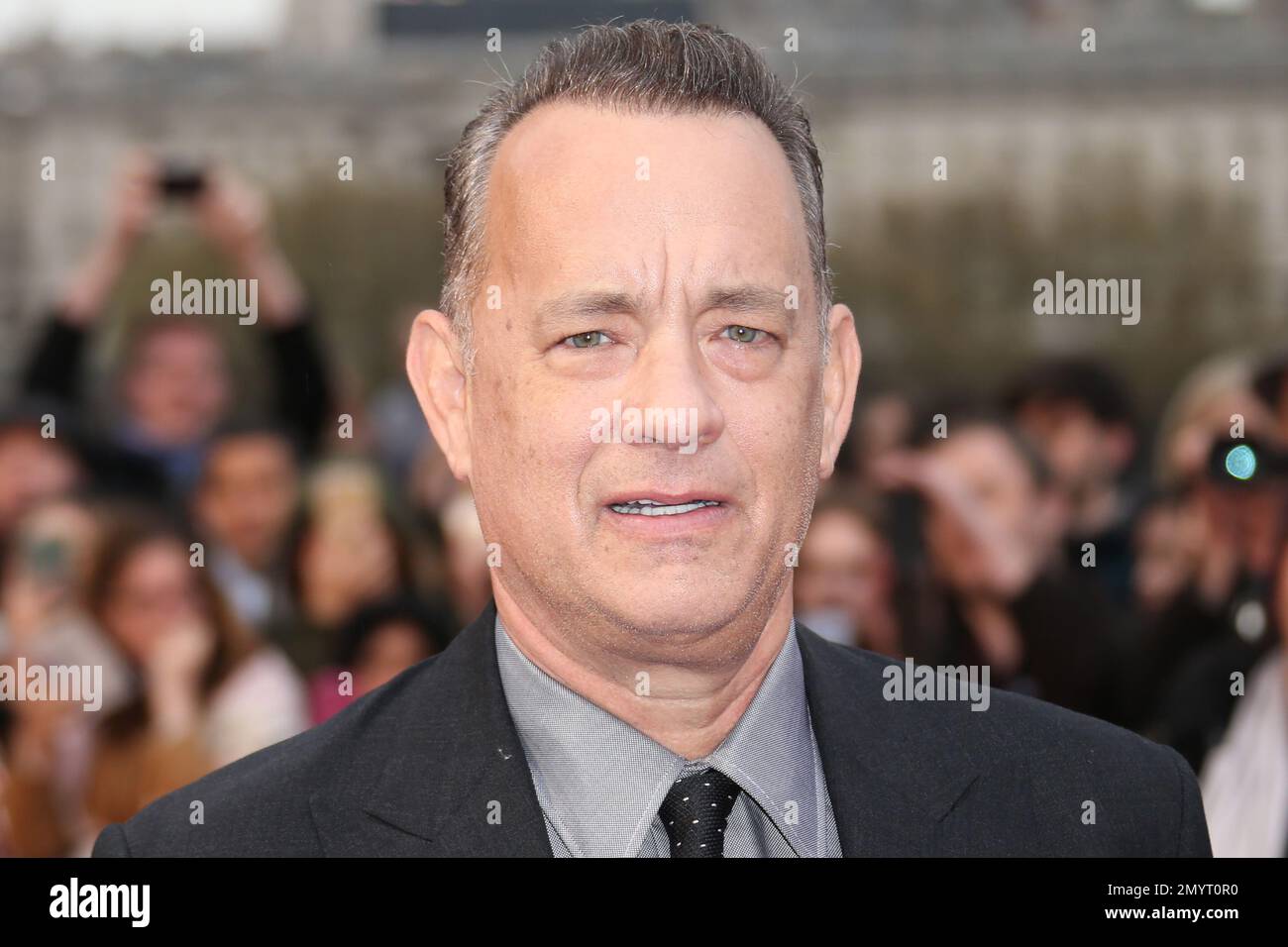 Actor Tom Hanks poses for photographers upon arrival at the premiere of ...