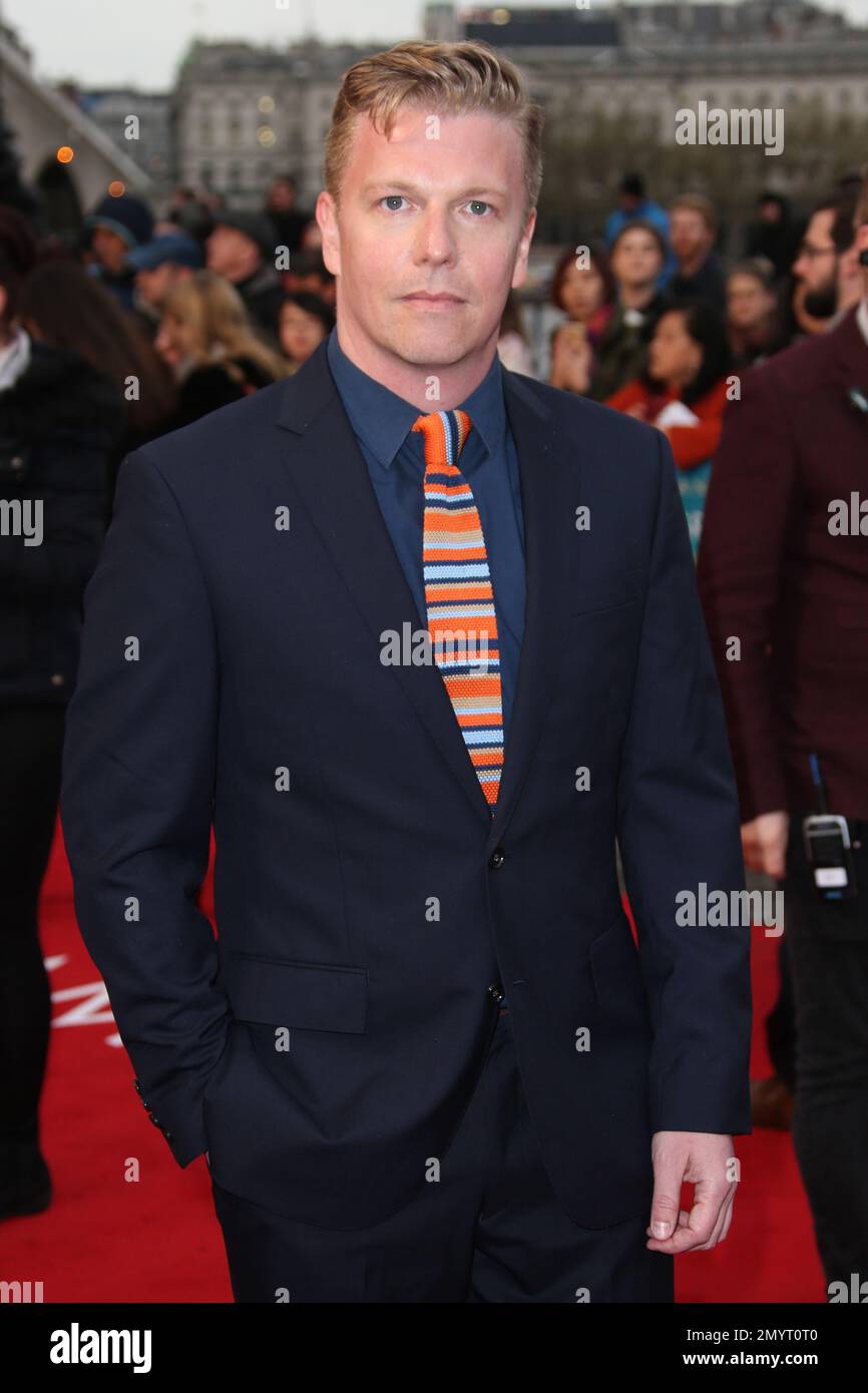 Actor David Menkin poses for photographers upon arrival at the premiere ...