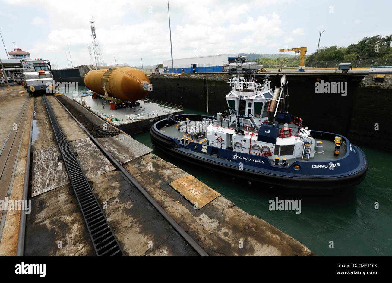 The tugboat and barge transporting NASA's only remaining space shuttle ...