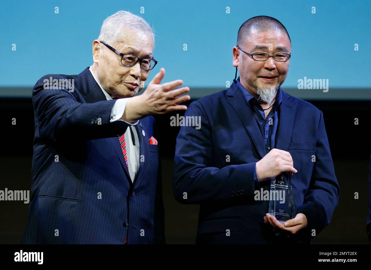 Japanese designer Asao Tokolo, right, and Tokyo 2020 Summer Olympic ...