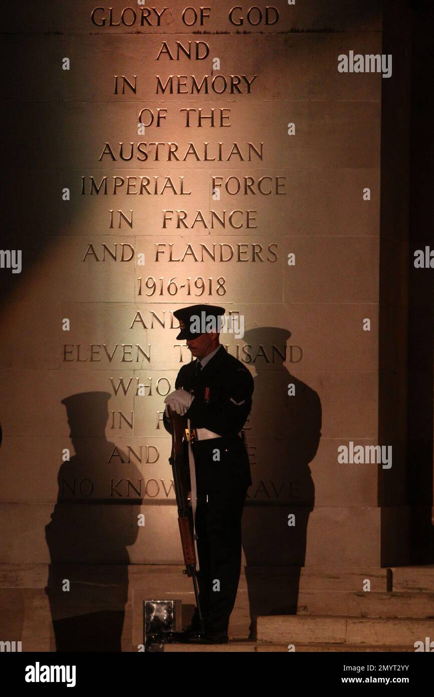 The shadow of an Australian soldier is cast on a monument for fallen ...