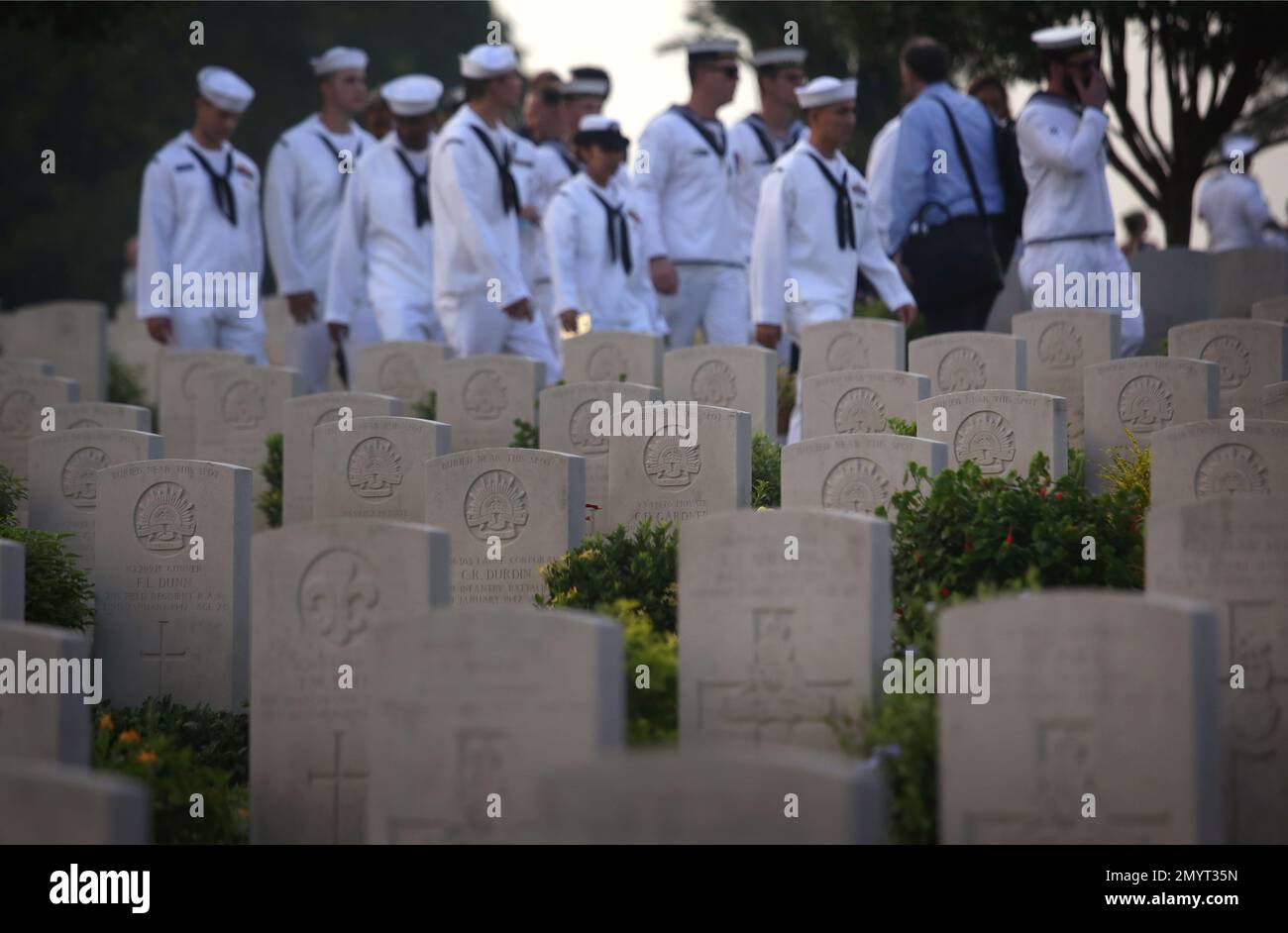 Australian naval personnel from the HMAS Albany and HMAS Melville walk ...